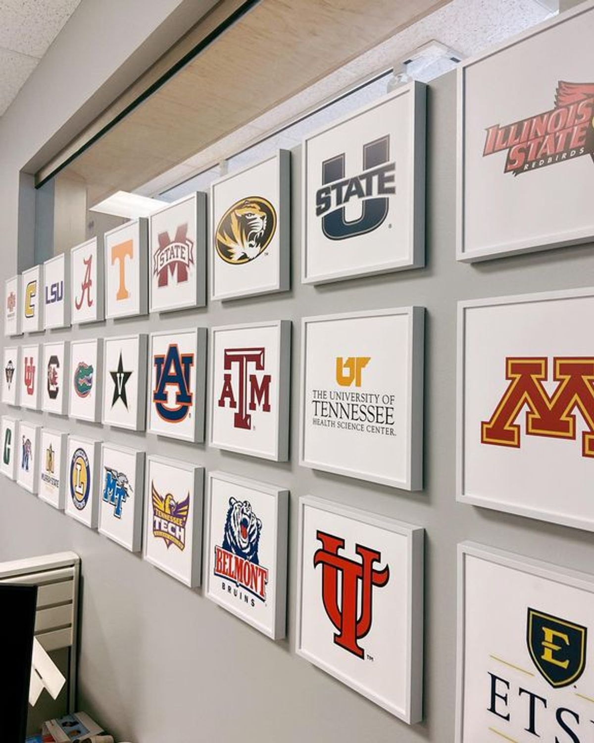 The collegiate wall in our office just h... - Blink Marketing